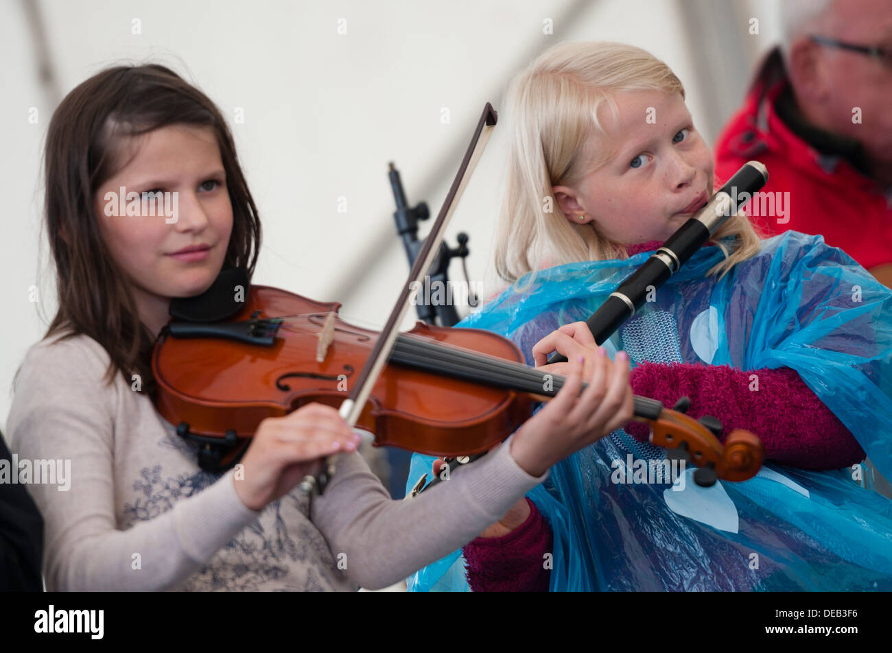 Two young girls playing musical instruments violin flute The National ...