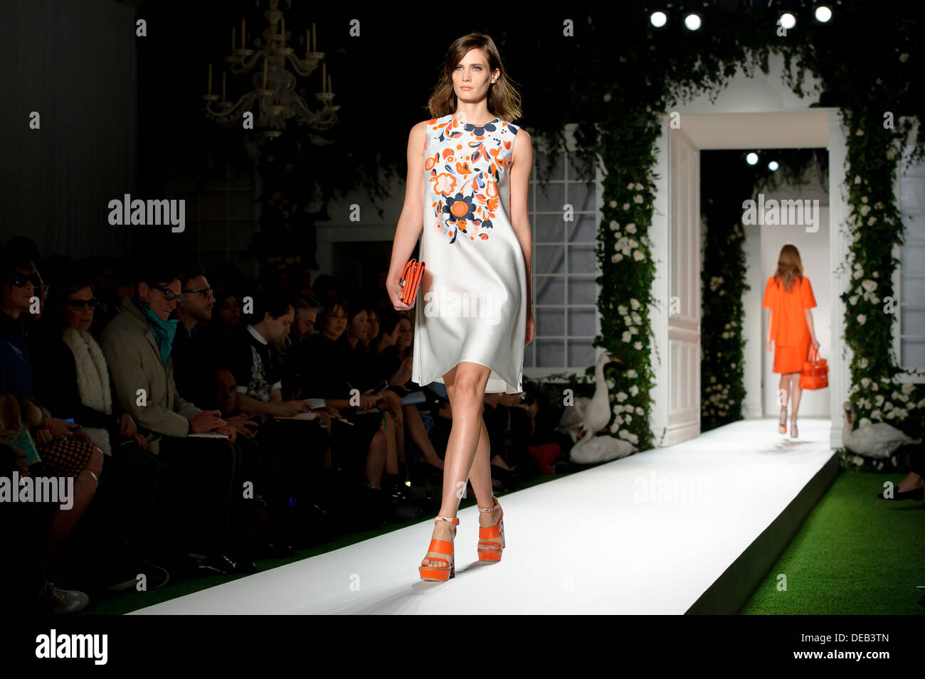 A model wears a design created by Mulberry during London Fashion Week ...