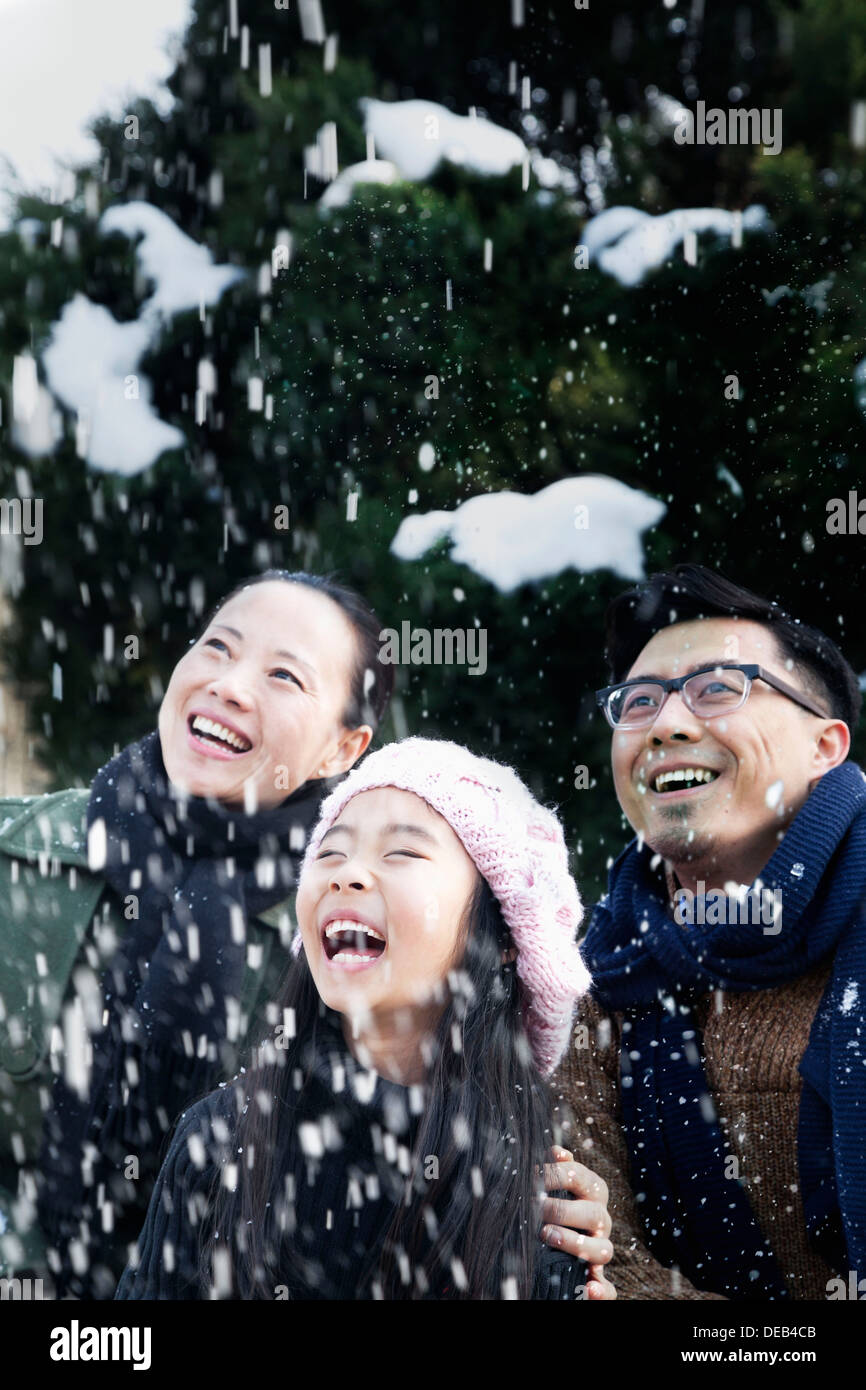 Family enjoying a snowy day Stock Photo - Alamy