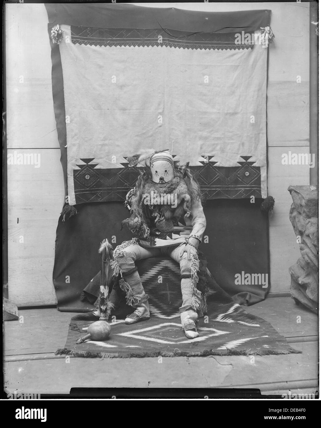 A Zuni person wearing traditional costume, showcasing the rich cultural ...