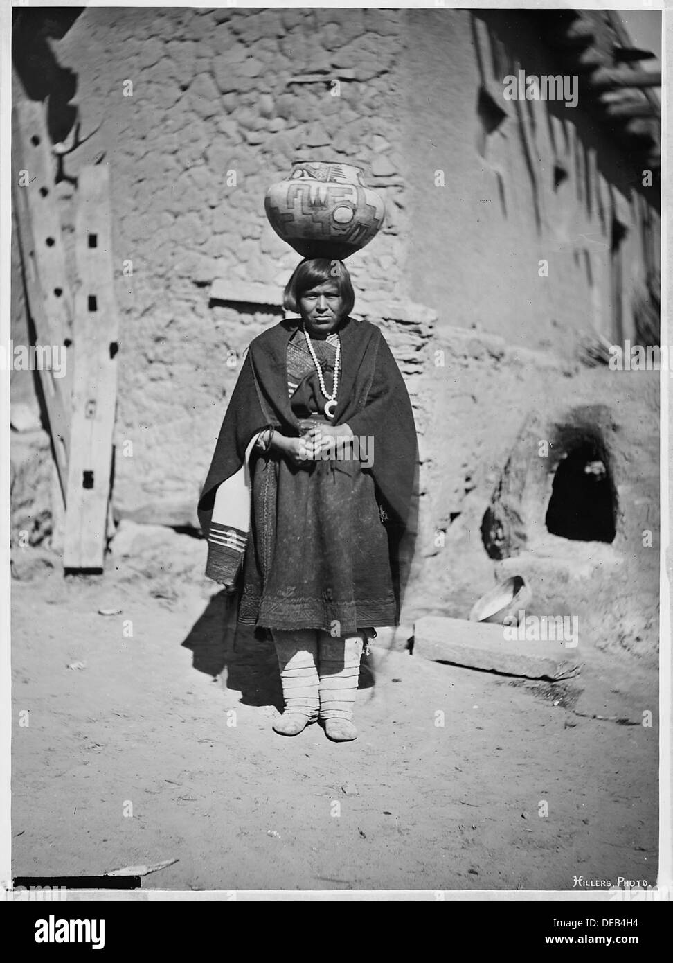 A Zuni water carrier, part of the traditional lifestyle of the Zuni ...