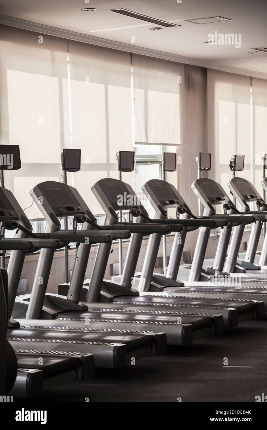 Row of treadmills Stock Photo - Alamy
