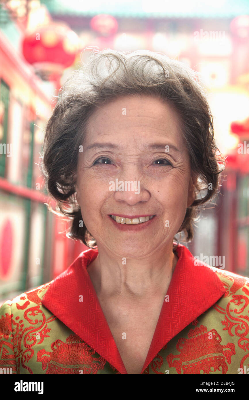 Portrait of senior woman in Chinese traditional clothing Stock Photo ...