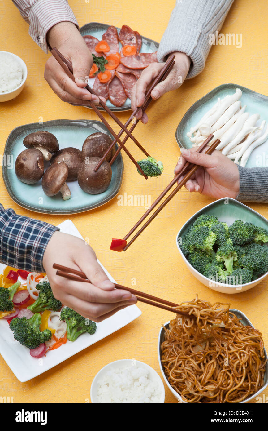 Adult using chopsticks hi-res stock photography and images - Alamy