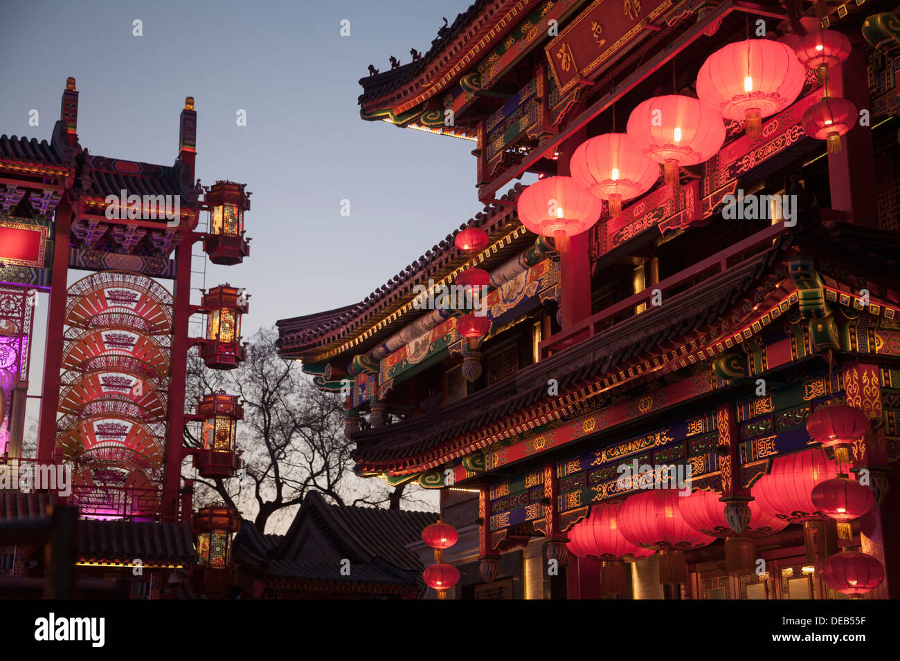 Traditional Chinese buildings illuminated at dusk in Beijing, China ...
