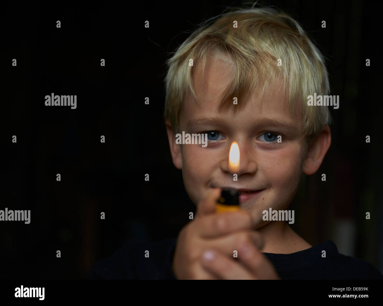 Child blond boy smoking cigarette Stock Photo - Alamy