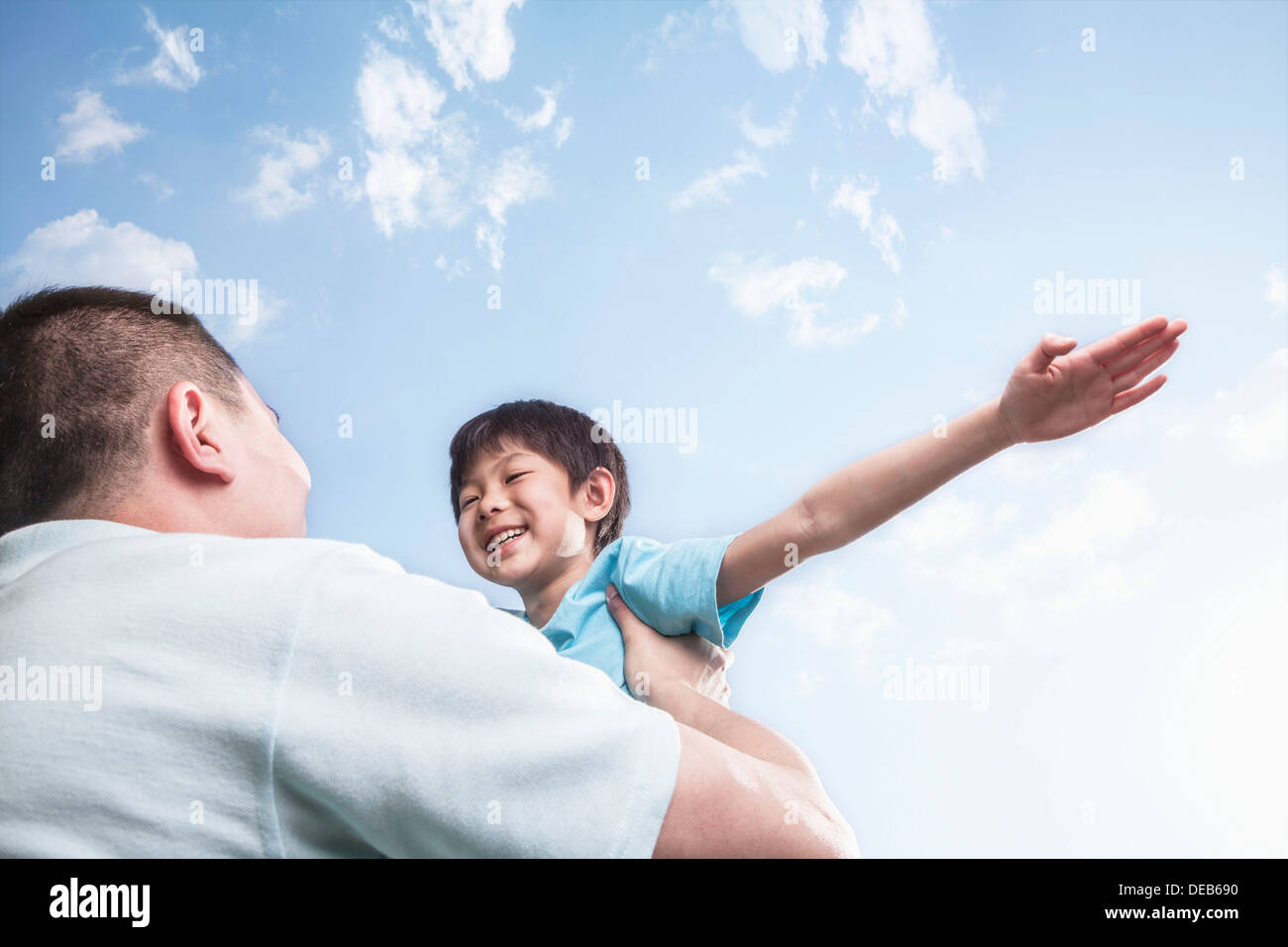 Lifting son hi-res stock photography and images - Alamy