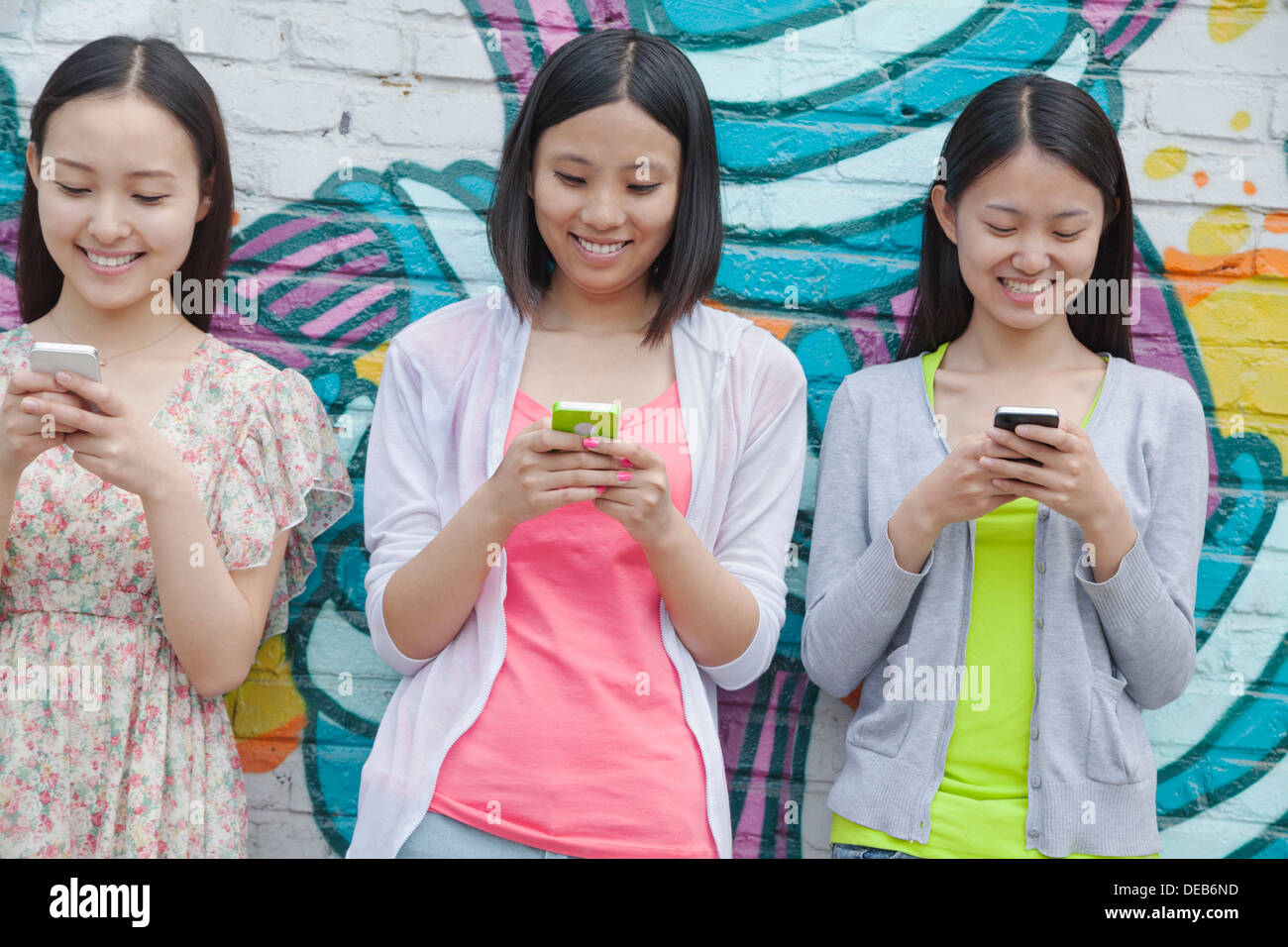 Woman standing side hi-res stock photography and images - Alamy