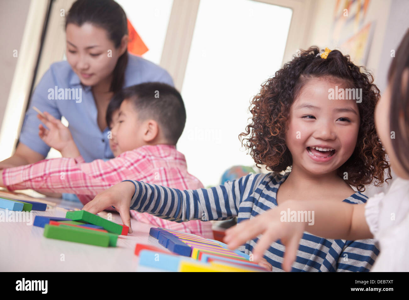 Children Playing in a Classroom Stock Photo - Alamy