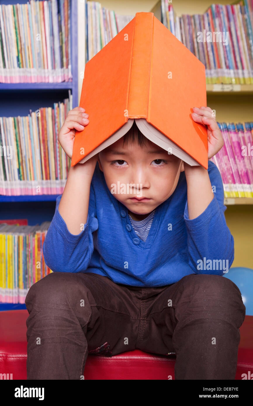 Unhappy boy book not man not girl hi-res stock photography and images ...