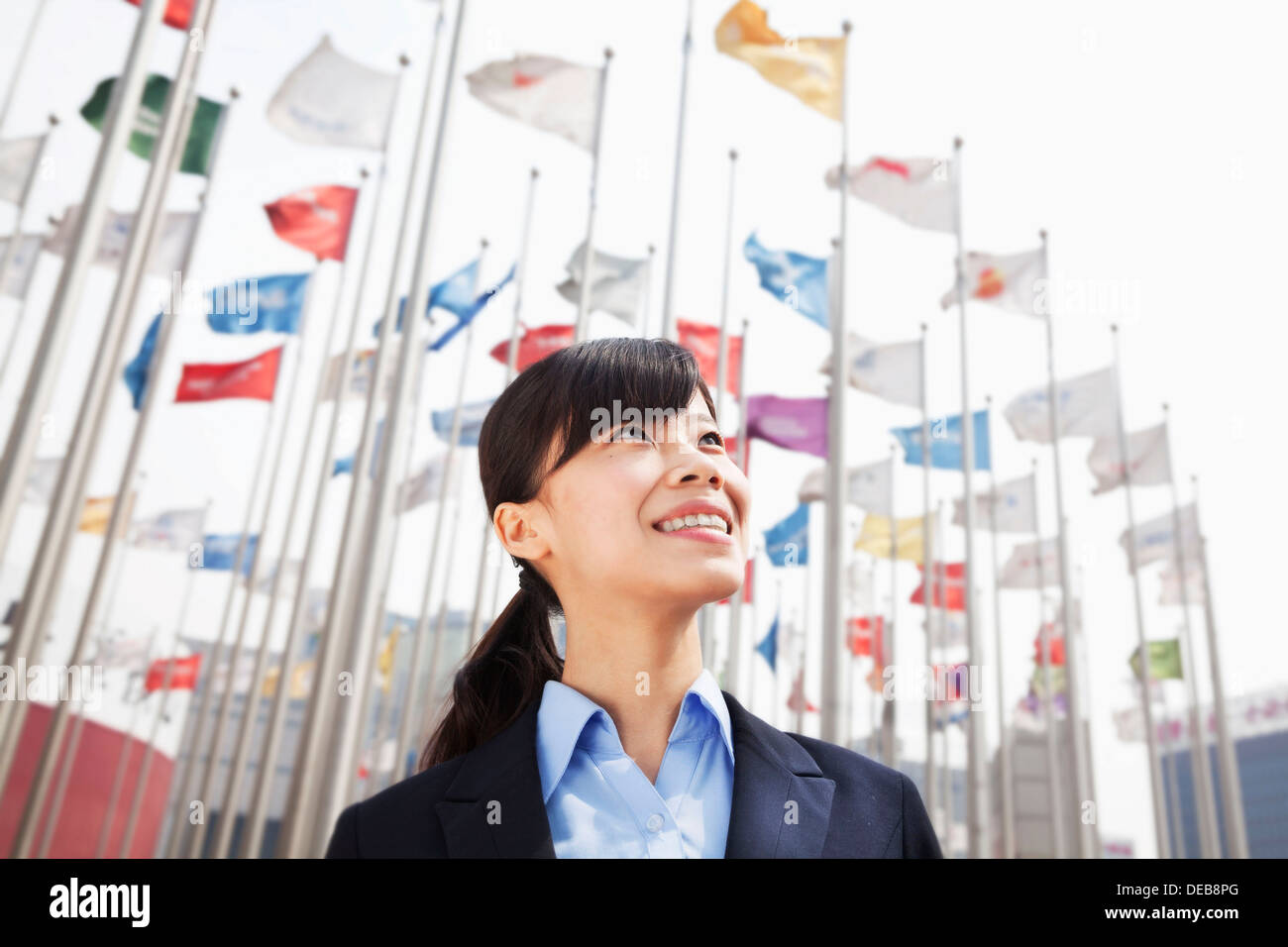 Standing smiling building exterior flag hi-res stock photography and ...