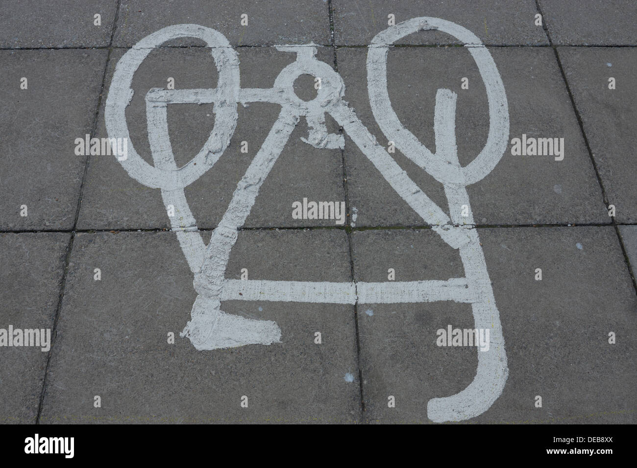 bike logo cycle lane concrete slabs sidewalk Stock Photo - Alamy