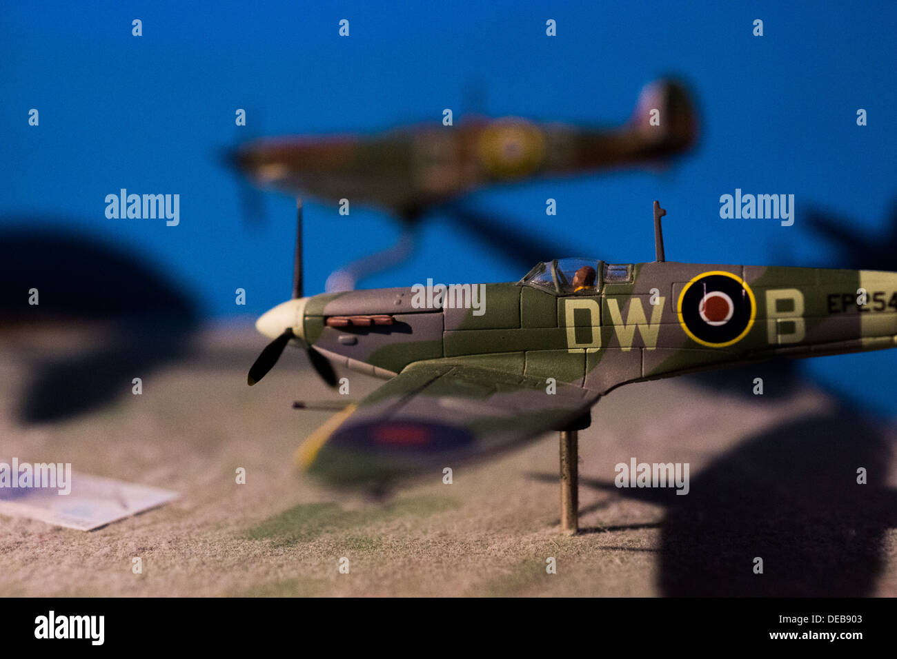 spitfire model planes blue wall shadows dust fly Stock Photo - Alamy