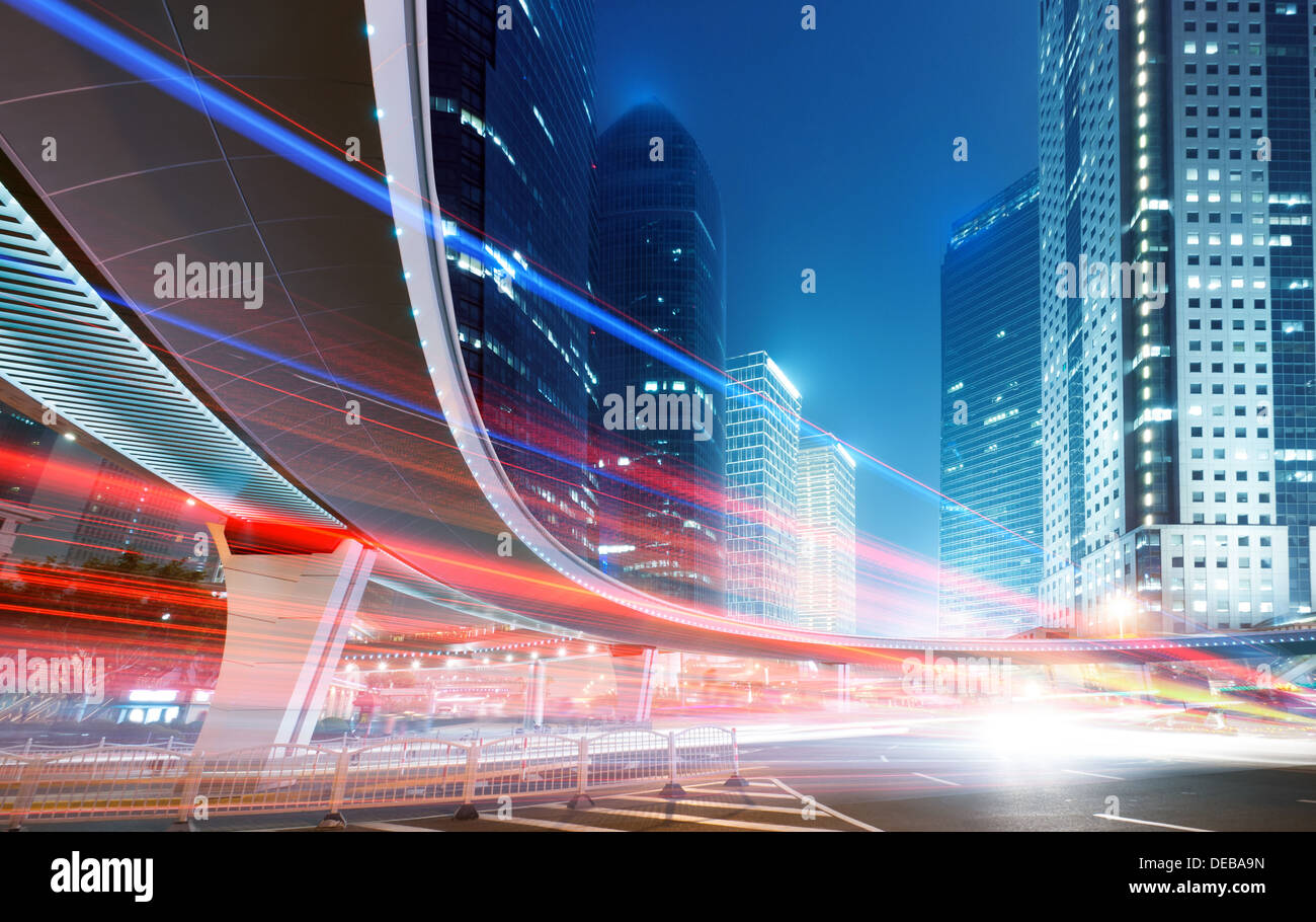 the light trails on the modern building background in shanghai china ...