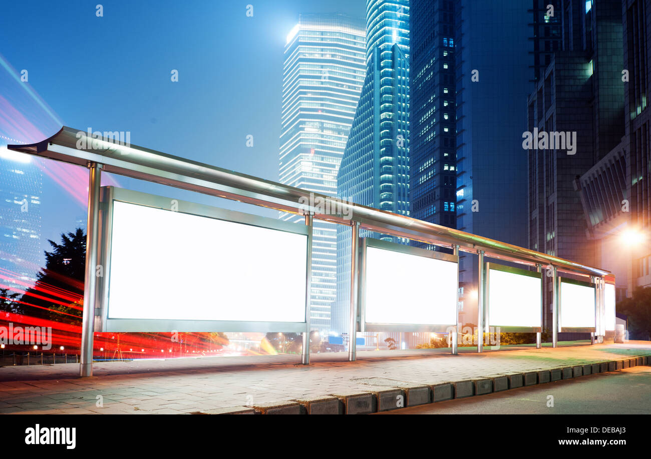 Blank billboard on bus stop at night Stock Photo - Alamy