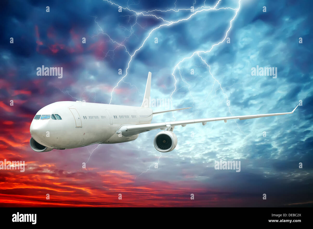 Aircraft flying in the night sky of lightning Stock Photo - Alamy
