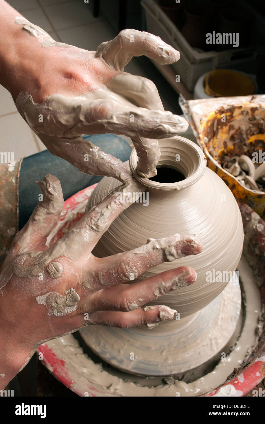 Creating an earthen jar on the circle hi-res stock photography and ...