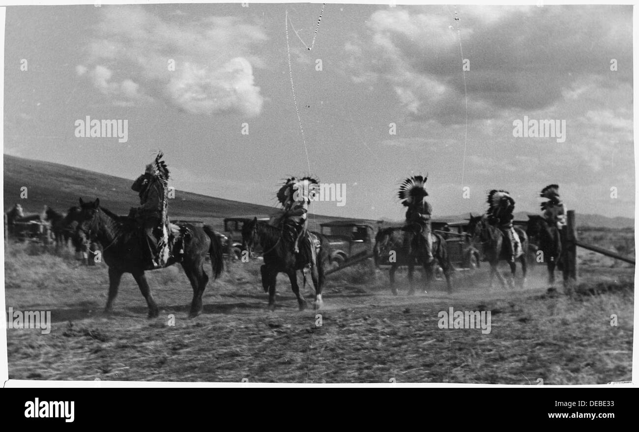 This photograph captures a parade taking place on the Fort Hall ...
