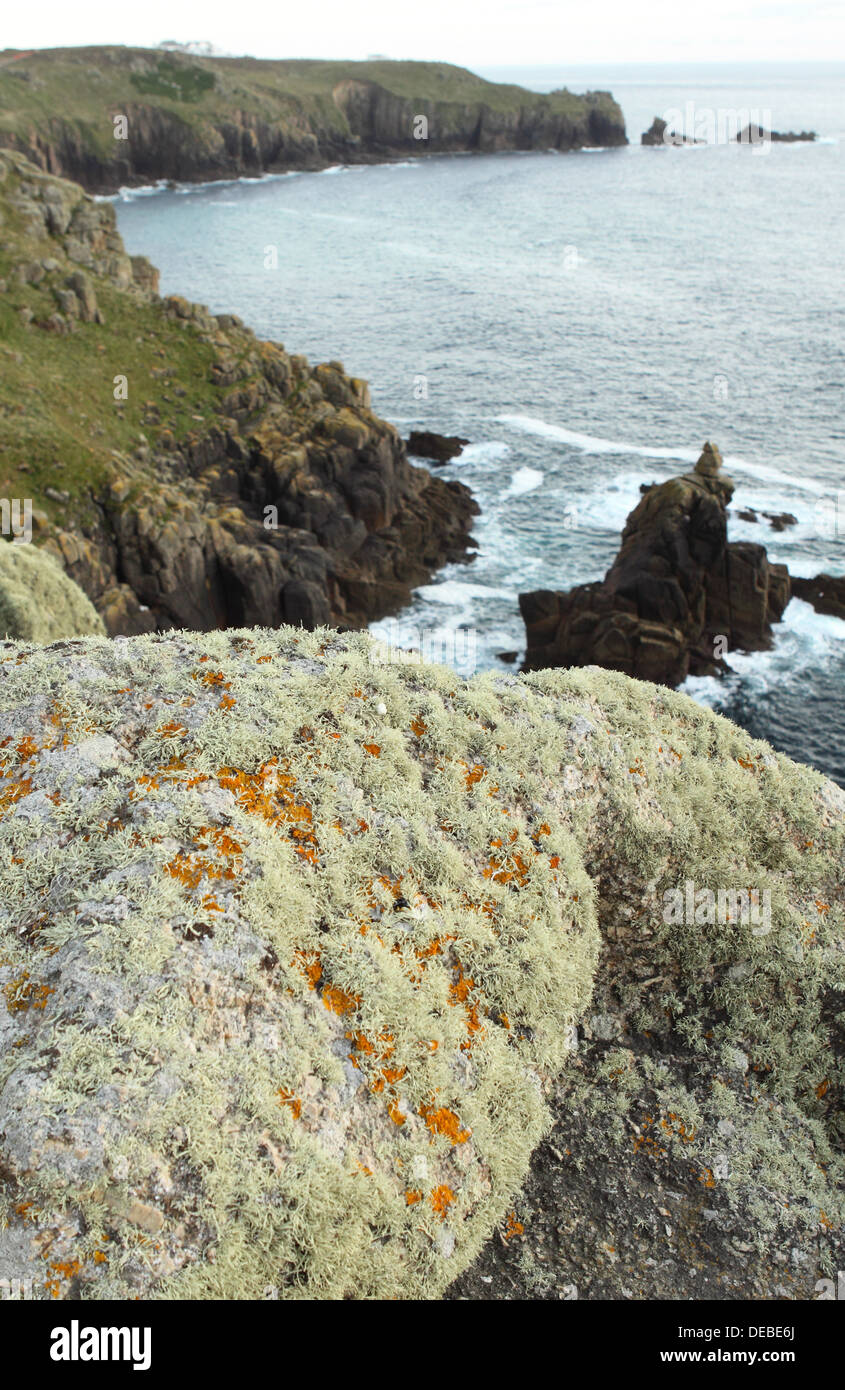 Lands End Cornwall as seen from lichen covered cliff rocks near Sennen ...