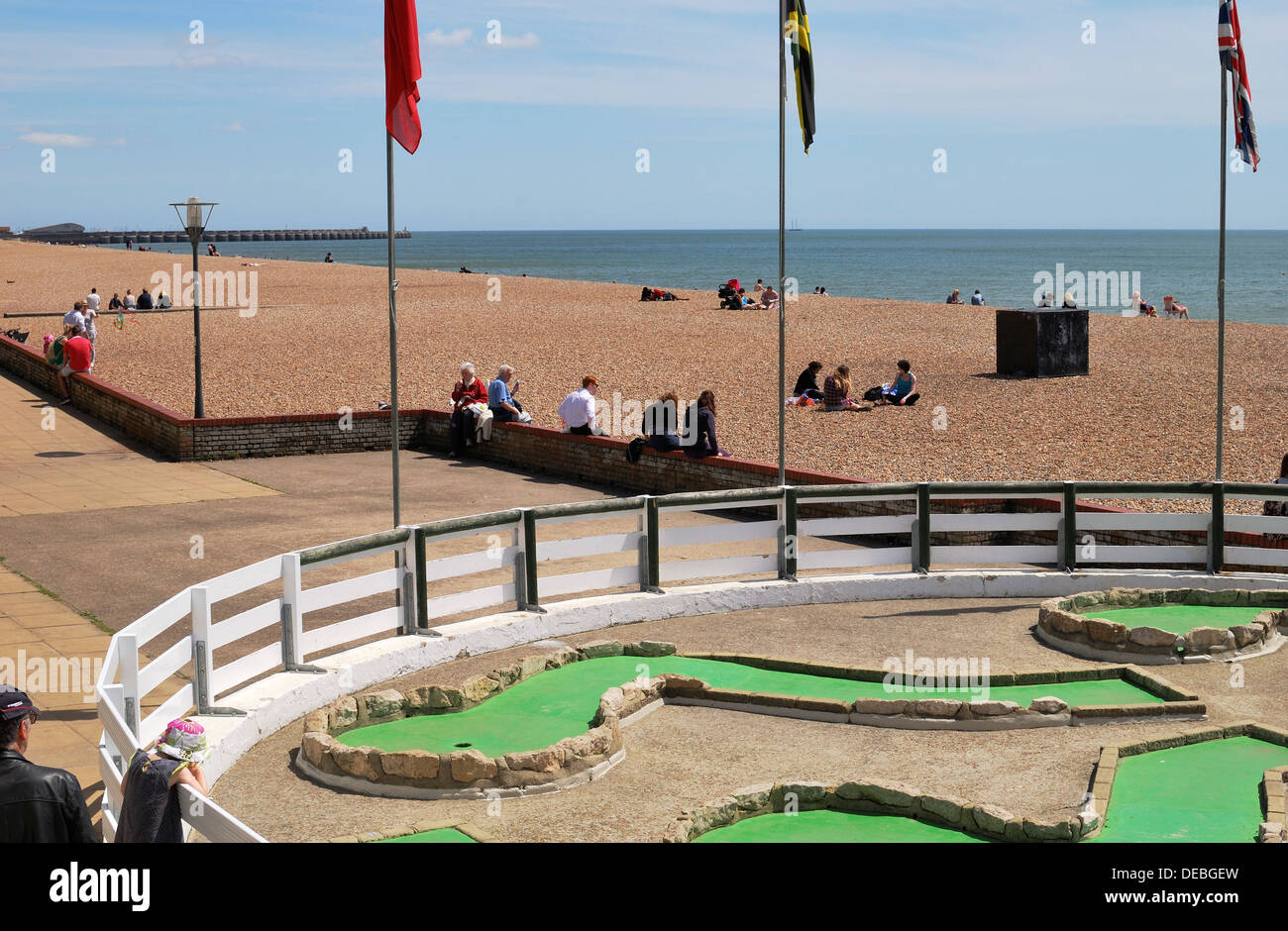 Beach and seafront at Brighton with people and crazy golf. Marina in ...