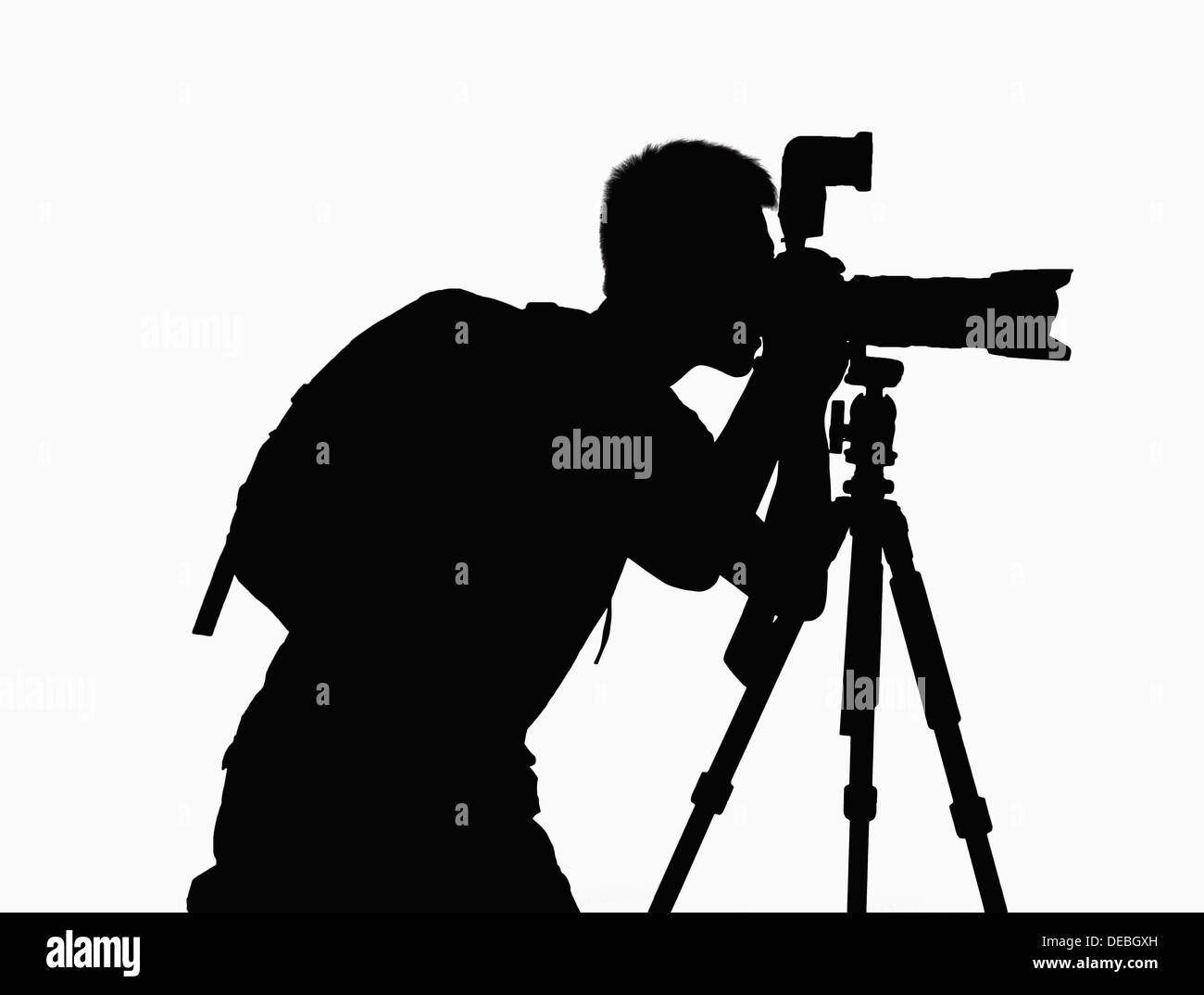 Silhouette of photographer taking pictures Cut Out Stock Images ...