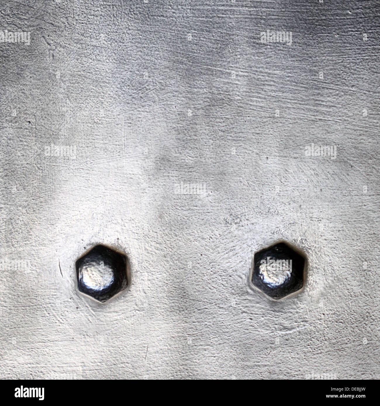 Black grunge metal plate or armour texture with rivets as background ...