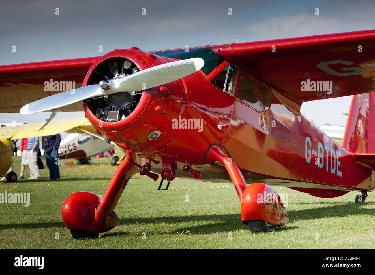 A classic red aeroplane at the Light Aircraft Association rally at ...