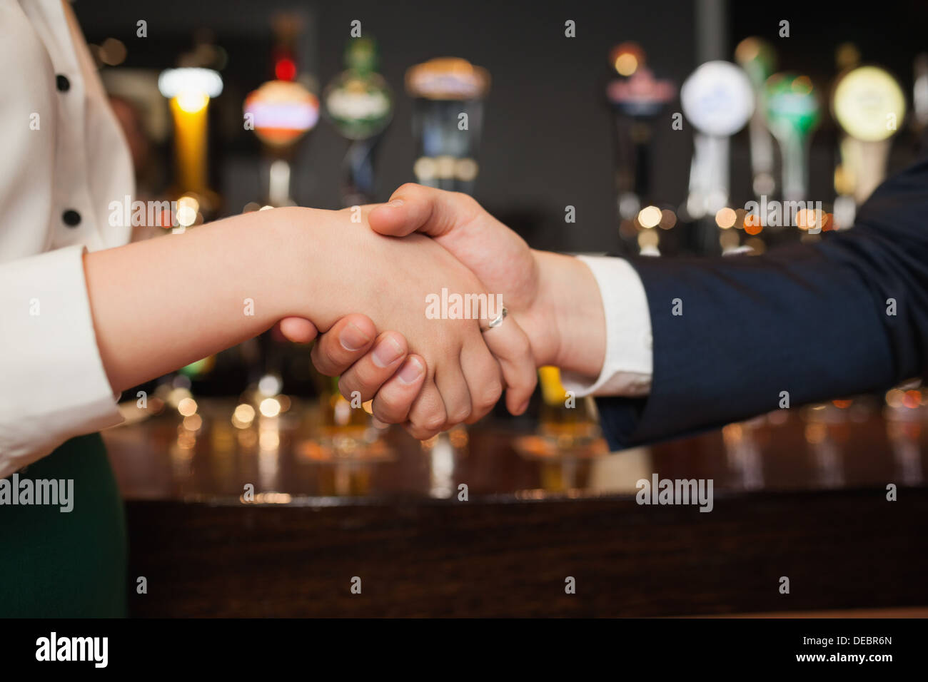 Hands on bar close hi-res stock photography and images - Alamy