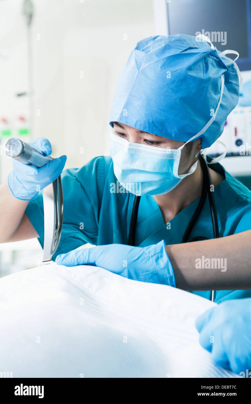 Surgeon looking down hi-res stock photography and images - Alamy