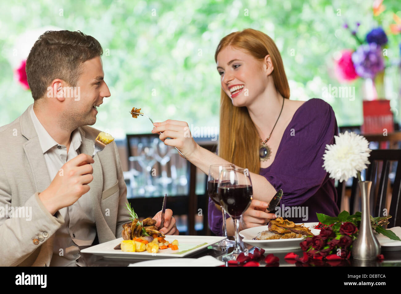 Man eating dinner suit hi-res stock photography and images - Alamy