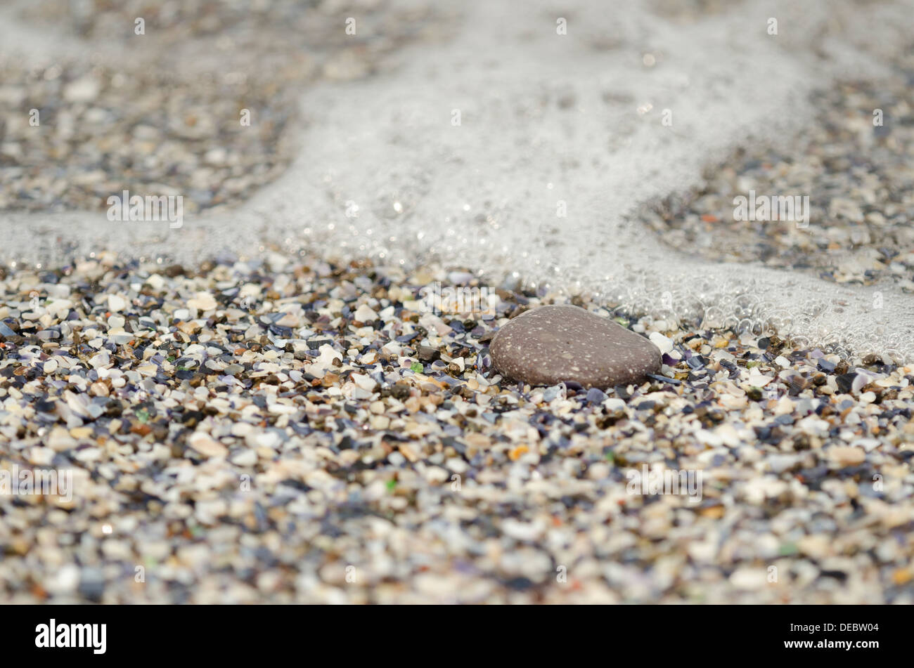 detail of pebble on sand beach Stock Photo - Alamy