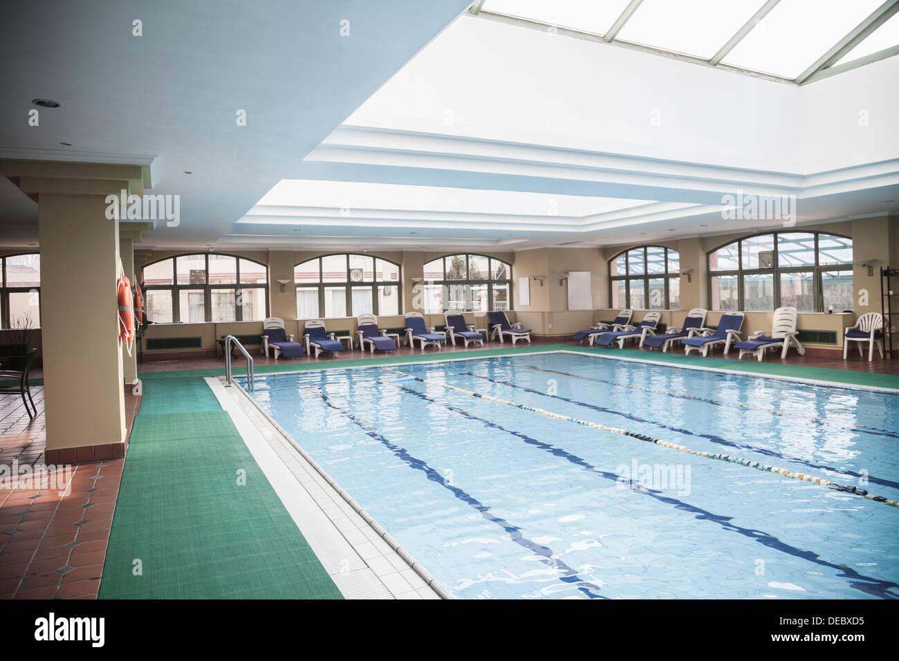 Large, indoor swimming pool with skylight Stock Photo - Alamy
