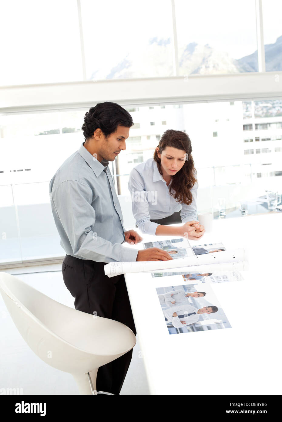 Partners working together using digital interface Stock Photo - Alamy