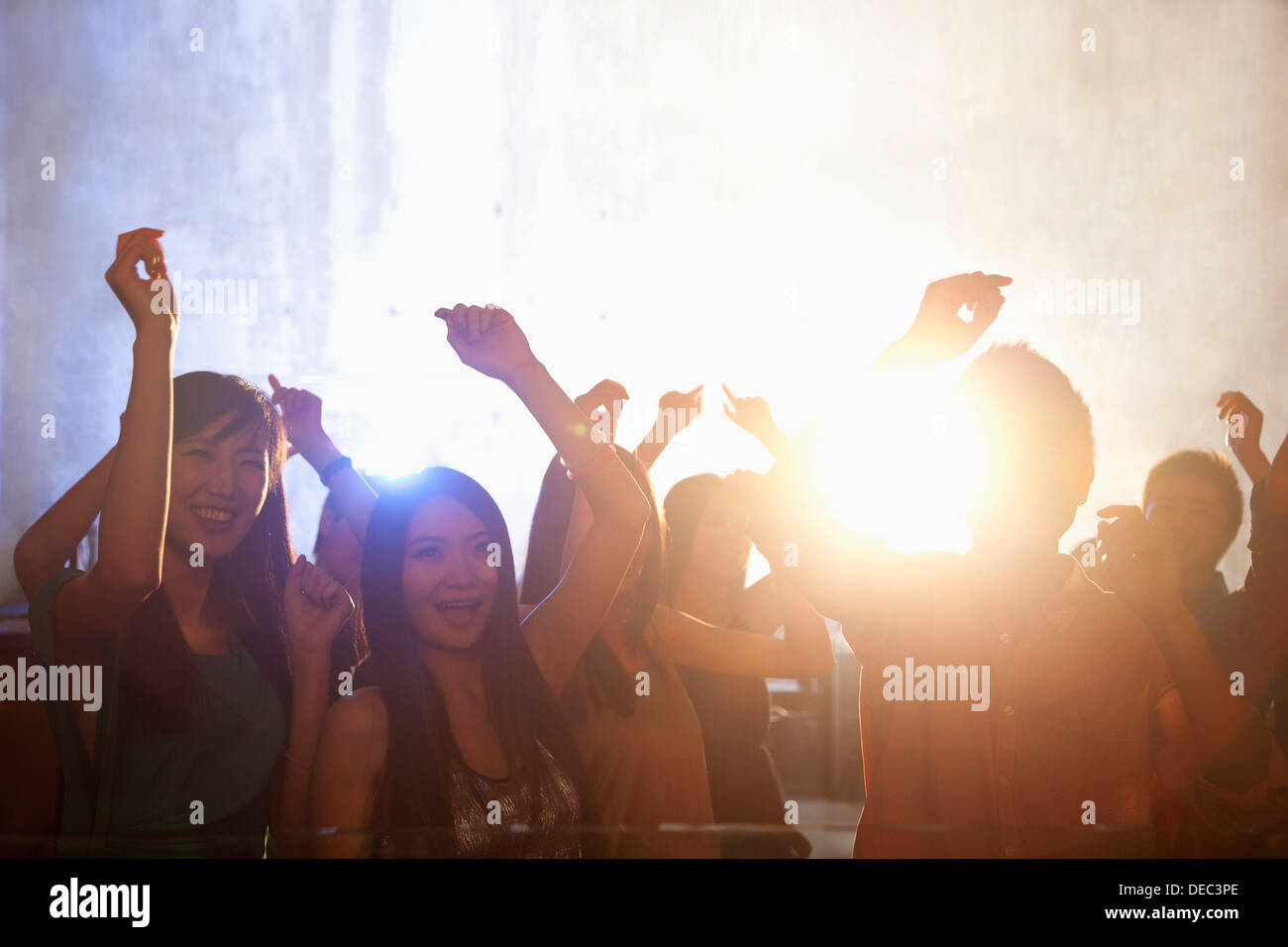 A crowd of young people dancing in a nightclub Stock Photo - Alamy