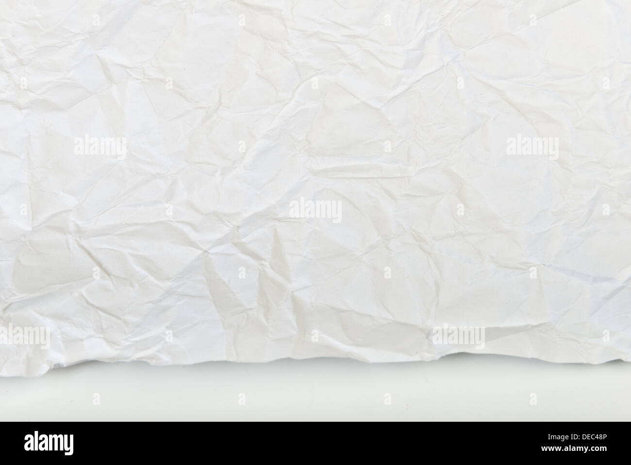 Crumpled white paper background Stock Photo - Alamy