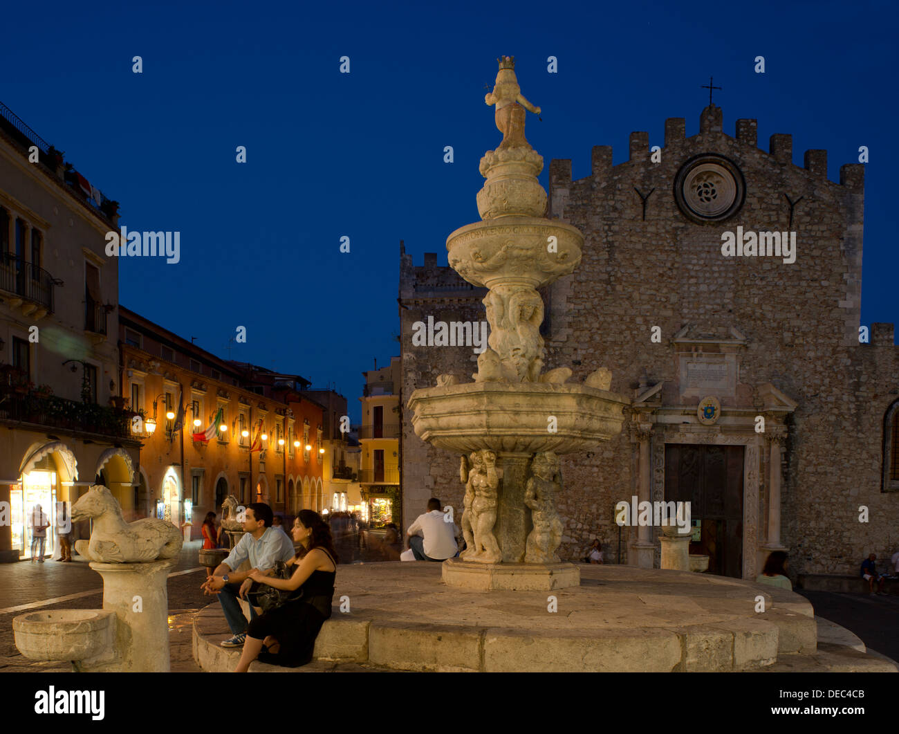 The Cathedral of San Nicolo and a Baroque fountain in the Piazza del ...