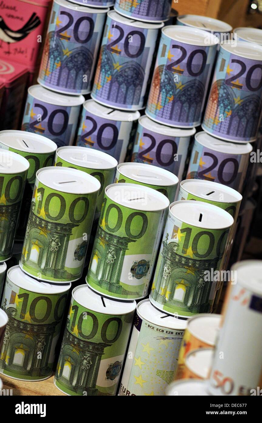 Metal money boxes with euro design Stock Photo - Alamy