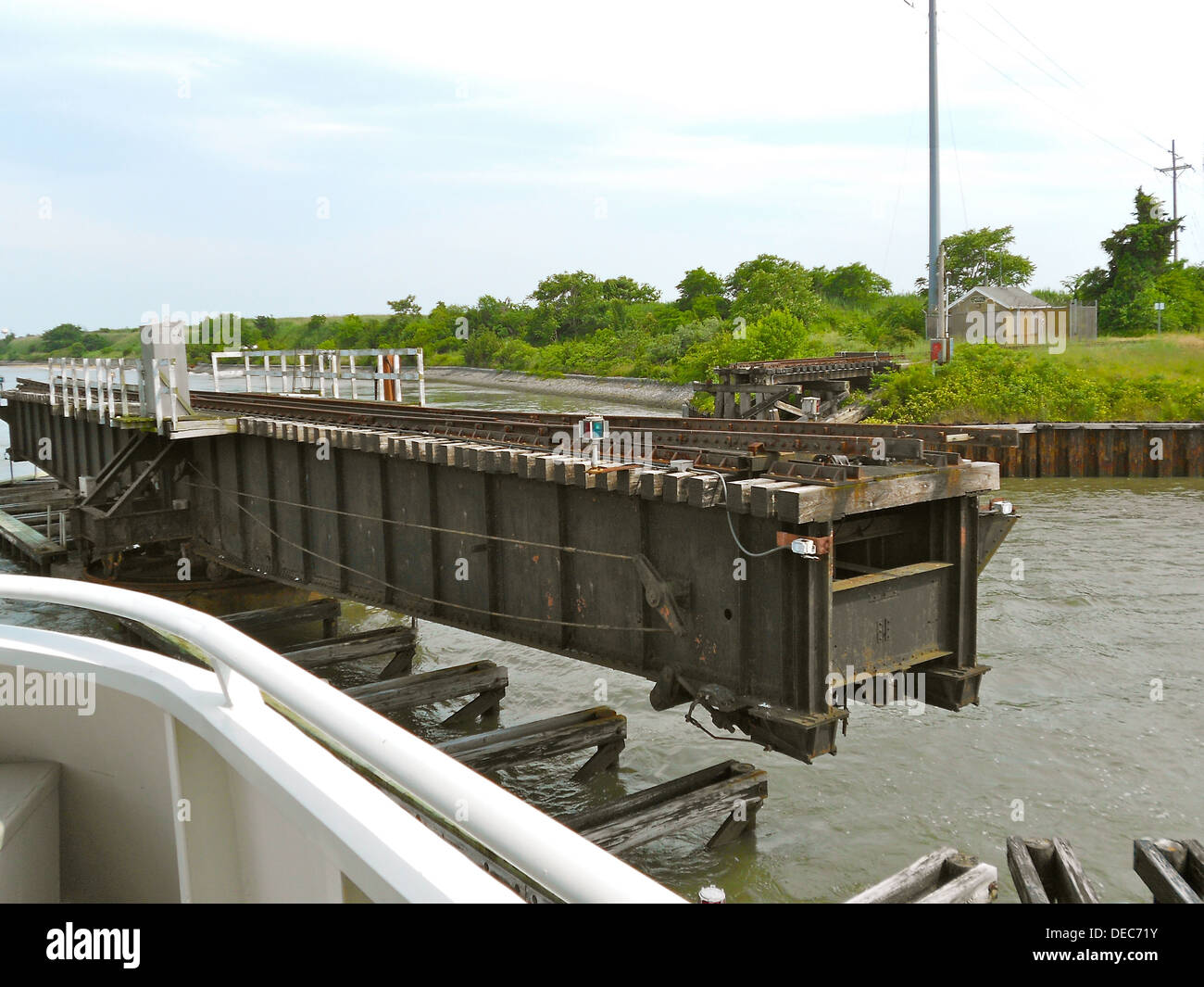 The old turntable-type railroad bridge spans the Cape May Canal ...