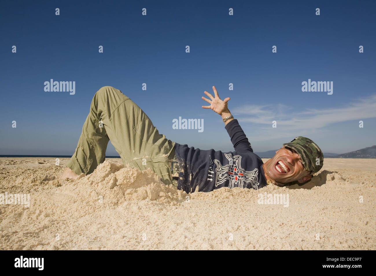 Man Coming Out of a Ditch Stock Photo - Alamy