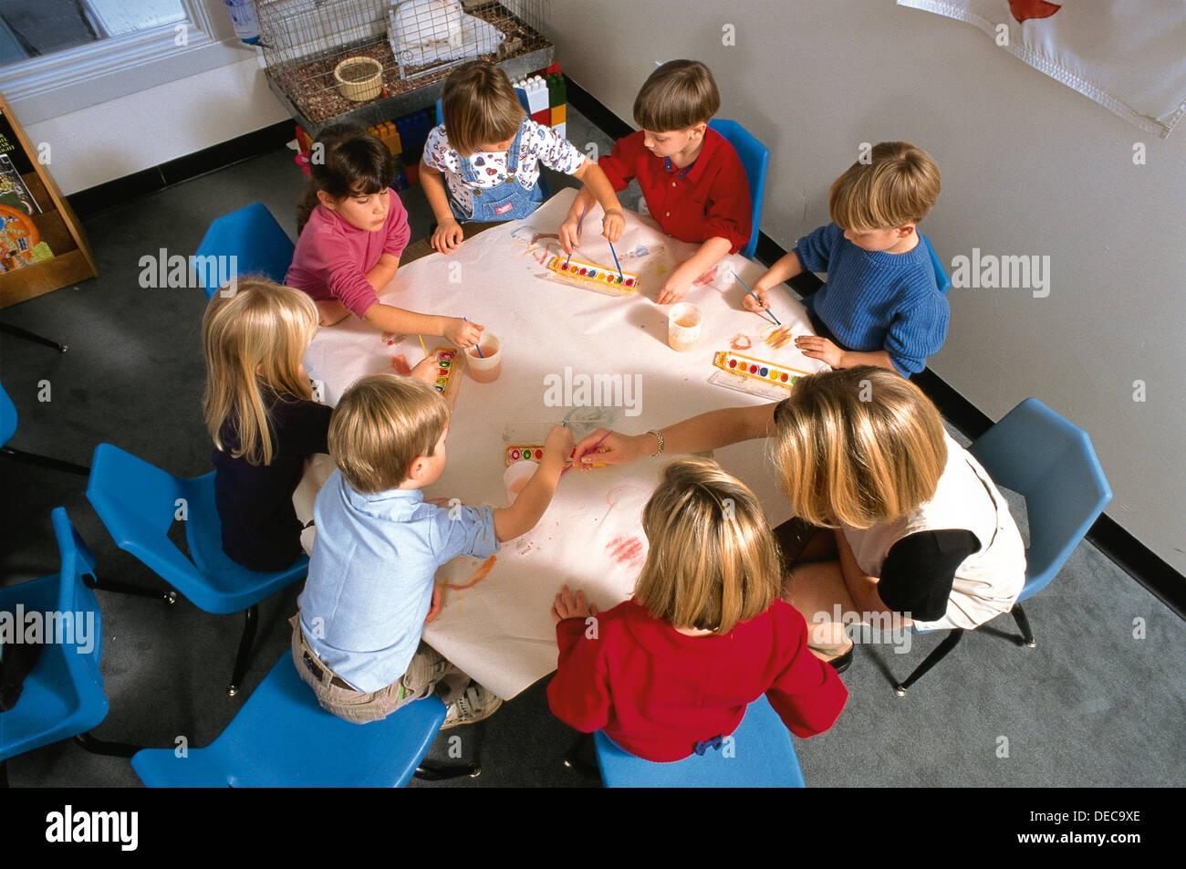 Group Children Sitting Round Table High Resolution Stock Photography ...
