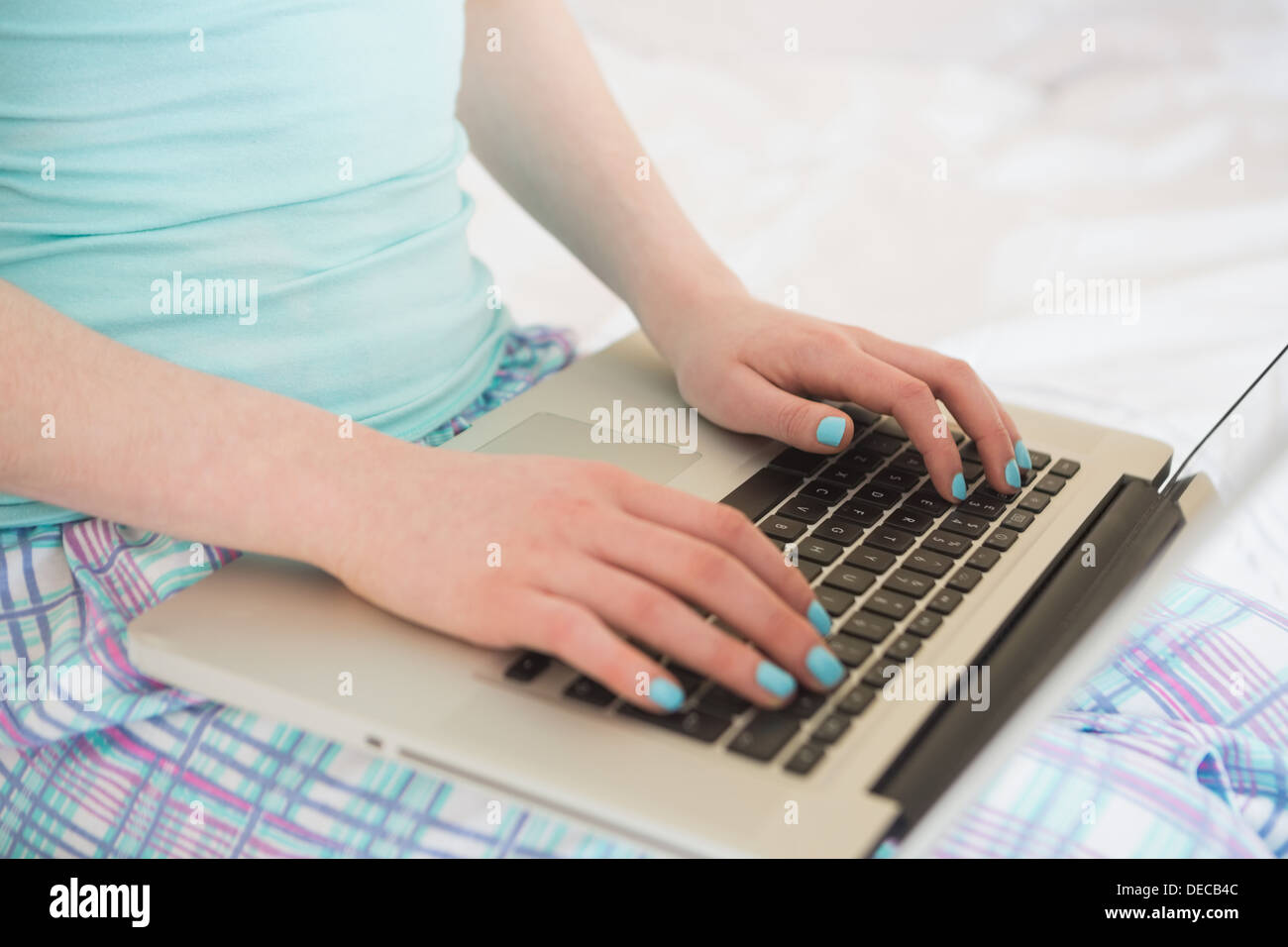 Girl laptop typing hi-res stock photography and images - Alamy