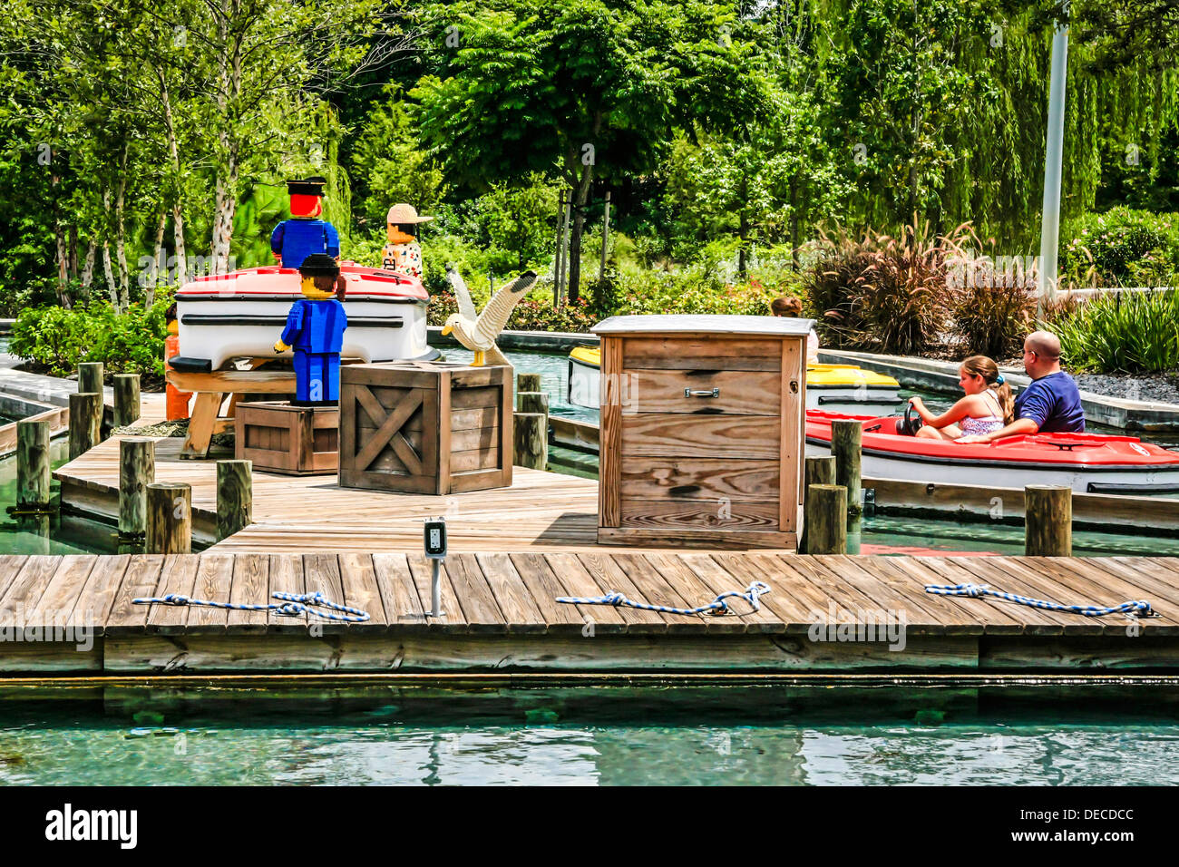 Driving a boat at Legoland Theme Park Florida Stock Photo - Alamy