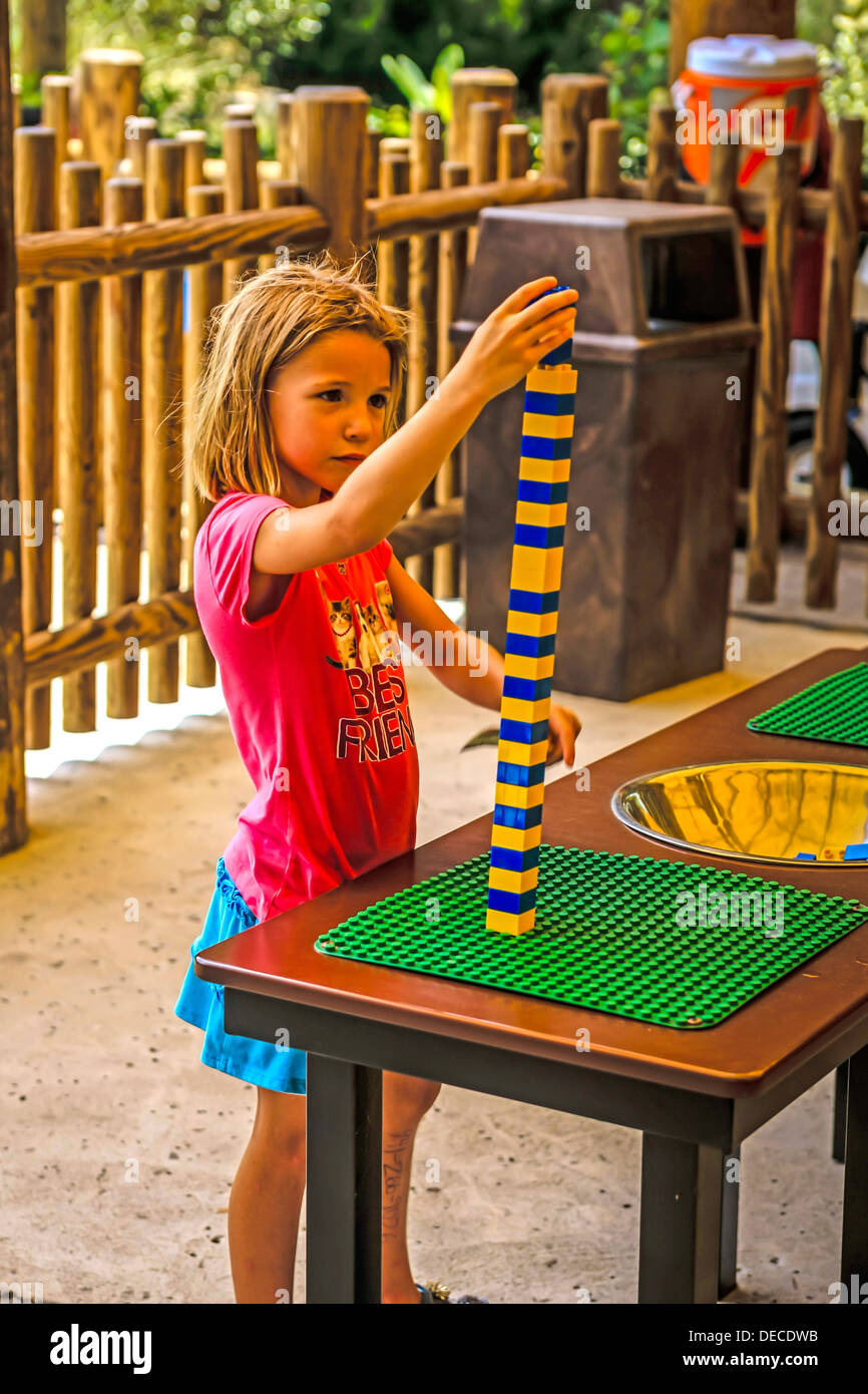 Young girl plays with Lego bricks at Legoland Florida Stock Photo - Alamy