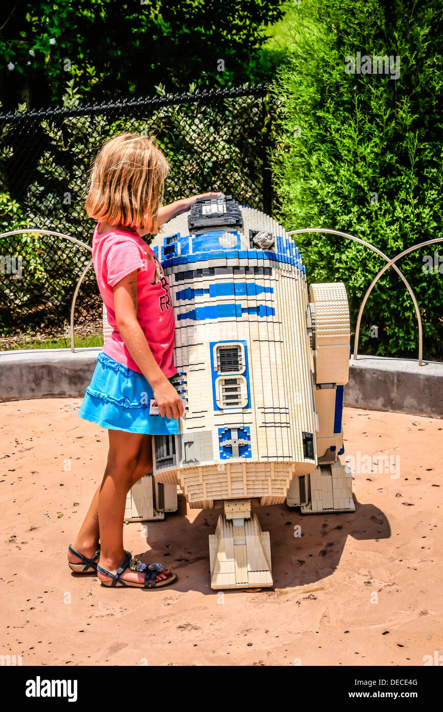 Young girl talks to R2D2 Star Wars character at Legoland Florida Stock ...