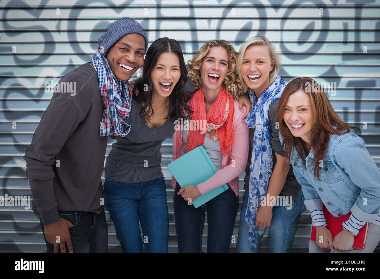 Happy group of friends laughing together Stock Photo - Alamy
