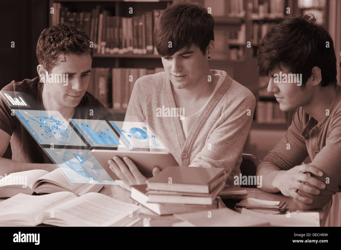 Focused students working on their digital tablet Stock Photo - Alamy