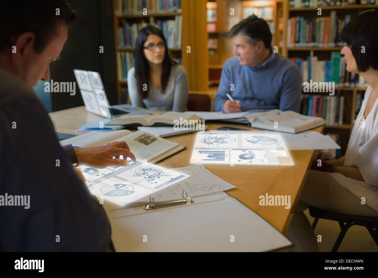 Focused mature students working on their digital tools Stock Photo - Alamy