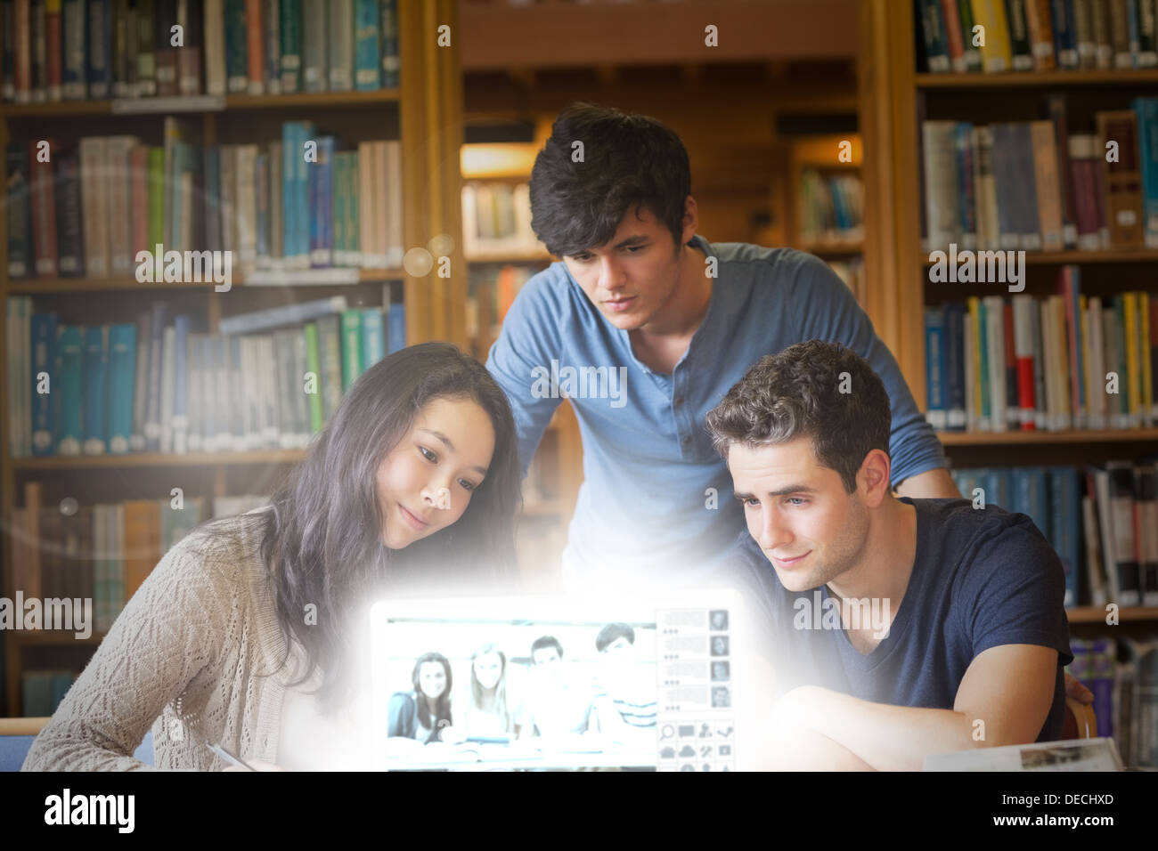 Content students watching pictures on digital interface Stock Photo - Alamy
