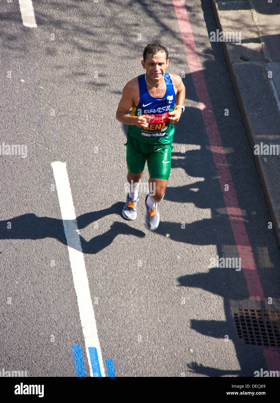 Paralympic champion Tito Sena of Brazil running in 2013 London marathon ...