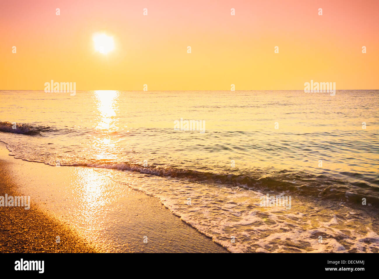 Soft sea ocean waves wash over golden sand background. Sunset, sunrise ...